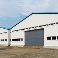 China Customizable Steel Structure Warehouse offering spacious and durable solutions for industrial production lines and equipment storage needs for sale