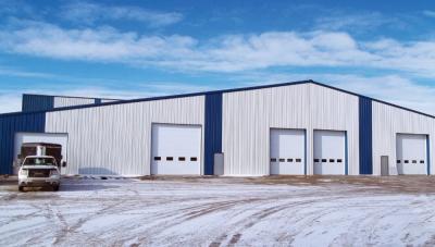China Heavy Duty Steel Structure Workshop With Bolt Connection And Heat Treated Steel Cladding for sale