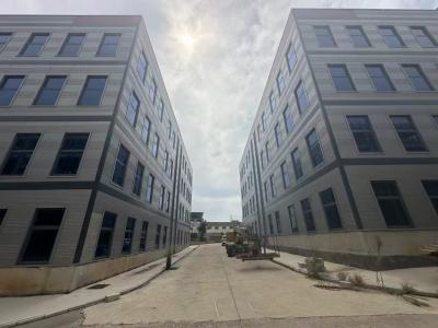 China Customized Curtain Wall Prefabricated Steel Buildings Durable Flexible Design for sale