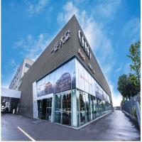 China Prefabricated High Strength Durable Steel Structure Warehouse Building Low-Cost Exquisite Metal Frame Car Showroom for sale