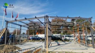 China Hot-DIP Galvanized Steel Structure Warehouse with Single/Double/Multi Slop and Angle Steel Bracing for Durable Storage for sale