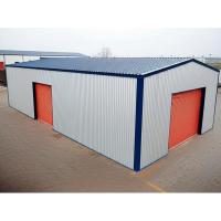 China Prefabricated Steel Structure Warehouse with High Seismic Zone Resistance Roll-up Door Type and 50 Years Warranty for sale