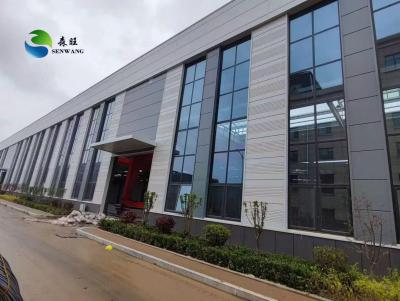 China Durable Steel Structure Warehouse with 50 Year Lifespan AWS D1.1 Welding Standard and PVC Downpipe for sale