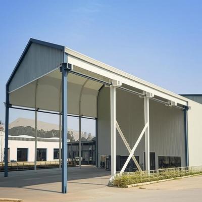 China Single Slope Rooftype Steel Structure Workshop with PVDF Sail Finishing and Q345 Main Steel for Earthquake Resistance ≥8 Grade for sale