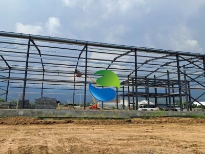China Steel Structure Warehouse with 50 Years Structural Warranty Sa 2.5 Sand Blasting and Sandwich Panel Heat Insulation for sale