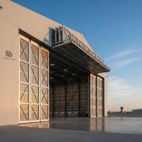 China Portal Rigid Frame Steel Structure Warehouse Incorporating Glass Wool Wall and Roof Optional Fire Protection System Ideal for Industrial for sale
