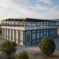 China Wind Load 0.35 kN/m² Steel Structure Warehouse with Earthquake Resistance Grade 8 and Galvanized Surface Treatment for sale