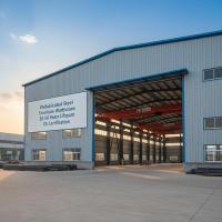 China H Section Column Beam Steel Structure Workshop Featuring Steel Sandwich Panel Walls and Concrete Foundation for Durable Construction for sale