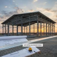 China Grid Steel Structure Steel Structure Warehouse Designed with DFT 70μm Paint and Double Slope Roof Offering Storage Space for sale