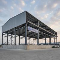 China Concrete Foundation Steel Structure Warehouse with Bolt Connection ASTM Standard providing and Safe Storage Environment for sale