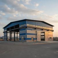 China Light Section Steel Steel Structure Warehouse Utilizing Raw Steel Material Q355B and Wall Steel Color Sheet or Sandwich Panel for Storage Buildings for sale