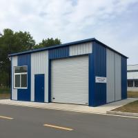 China Steel Color Sheet Or Sandwich Panel Wall Steel Storage Building With Door And Window According To Customer Request And Space Saving for sale