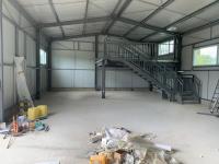 China High Prefabrication Accuracy Steel Structure Warehouse with Tolerance ±3% and 50 Years Longevity for sale