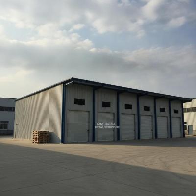 China Flat Roof Steel Storage Building Easy Install Metal Structure Ideal for Commercial Warehousing and Bulk Goods Protection for sale