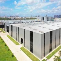China Roof Live Load 0.35kn M2 Steel Structure Warehouse Incorporating Circular Steel Tube Tie Rod and Plane Skylight Lighting for Storage Space for sale