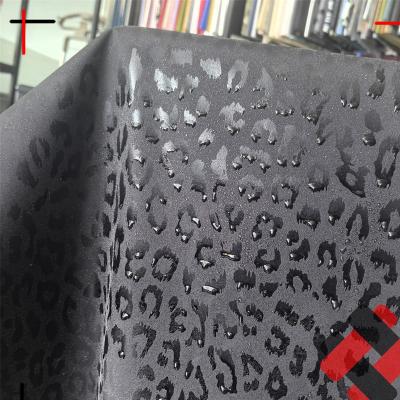 China Water Reactive Leopard Print 3-in-1 Polyester Shell Fabric for Outdoor Garment for sale