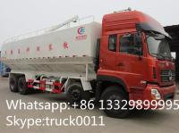 China Dongfeng tianlong 8*4 40-45cbm animal poultry feed truck for sale, 20tons hydraulic farm-oriented feed tank truck for sale