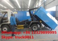 China dongfeng brand 4*2 LHD mini hydraulic arm trash truck for sale, hot sale factory price forlandhook lift garbage truck for sale