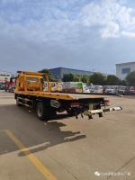 China Skid-Proof Rollback Tow Truck with Hoist Operation On Both Sides of Truck and Remote Control Available for sale