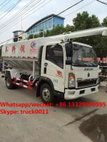 China Factory sale SINO TRUK HOWO LHD 12m3 farm-oriented animal feed truck, best price HOWO livestock and bulk feed vehicle for sale