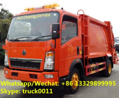China SINO TRUK HOWO 4*2 RHD 5CBM 4tons wastes collecting vehicles, refuse garbage trucks customized for Timor-Leste clients for sale