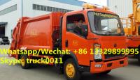 China SINO TRUK HOWO 4*2 RHD 5CBM 4tons wastes collecting vehicles, refuse garbage trucks customized for Timor-Leste clients for sale