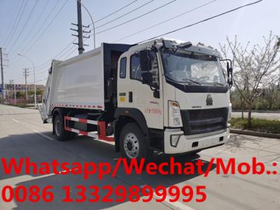 China Customized SINO TRUK HOWO 4*2 RHD12CBM garbage compactor truck for sale, 10T compacted garbage vehicle for KENYA for sale
