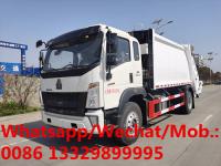 China Customized SINO TRUK HOWO 4*2 RHD12CBM garbage compactor truck for sale, 10T compacted garbage vehicle for KENYA for sale