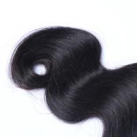 China 10A Grade Raw Indian Virgin Human Hair Curly Body Wave Bundles 100g 10-32inch for sale