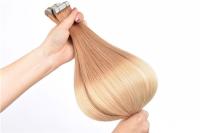 China Curly Remy Tape In Human Hair Extensions Cuticle Aligned 50g Pack 12-24 Inch for sale