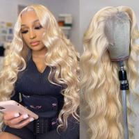 China Unprocessed Human Hair 613 Blonde Wig Transparent Lace Front Wig 8-22 inch Straight Body Wave for sale