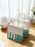 China Custom Recyclable Disposable Kraft Paper Twisted Handle  Bag Printing Take Away Bag for sale