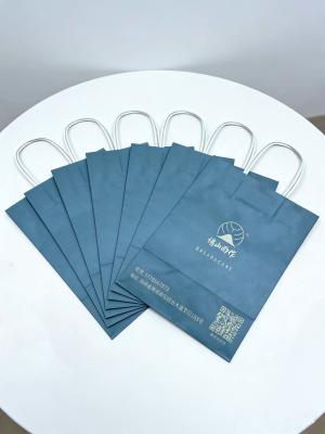 China Customized Kraft Paper Twisted  Handle Bag Printing Take Away Bag for sale