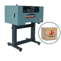 China AB Film DTF UV Printer with 300mm Width and CMYK+W+V Color System for Industrial Printing for sale