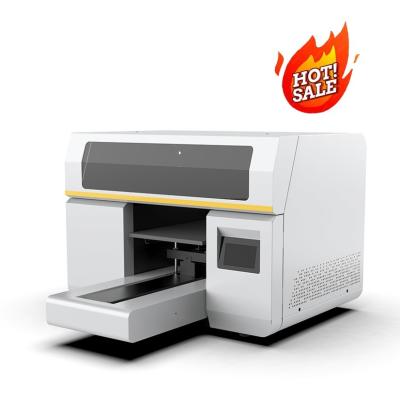 China Digital A3 Size Hybrid UV Printer Roll To Roll Printing UV Inkjet Printer for sale