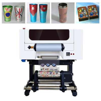 China 300mm UV DTF Printer with Varnish - 95kg Industrial Printing Machine for Fabric & Plastic for sale