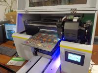 China Small Size A3 UV Hybrid Mobile Phone Cover Printing Machine With Single Head for sale