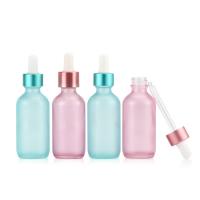 China Semi Transparent Blue Pink Glass Dropper Empty Essential Oil Bottle 30ml for sale
