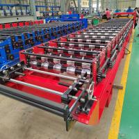 China Iron 0.3-0.8mm trapezoidal roof sheet roll forming machine metal panel making machine for sale