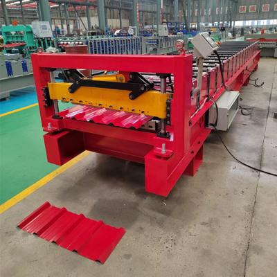 China Iron 0.3-0.8mm trapezoidal roof sheet roll forming machine metal panel making machine for sale