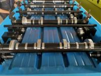 China Iron 0.3-0.8mm trapezoidal roof sheet roll forming machine metal panel making machine for sale