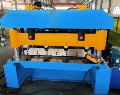 China Iron 0.3-0.8mm trapezoidal roof sheet roll forming machine metal panel making machine for sale
