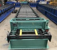 China Iron steel roof panel roll forming machine hydraulic cutting ibr making machine for sale