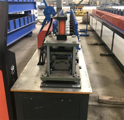 China Metal Shutter Door Roll Forming Machine Double Roller Shutter Door Slat Machine for sale