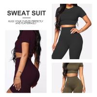 China 1000 HEXIN Round Neck Suit Hollow Out Back Elastic Sportswear Yoga Set Women Plaid for sale