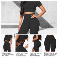 China 1000 HEXIN Round Neck Suit Hollow Out Back Elastic Sportswear Yoga Set Women Plaid for sale