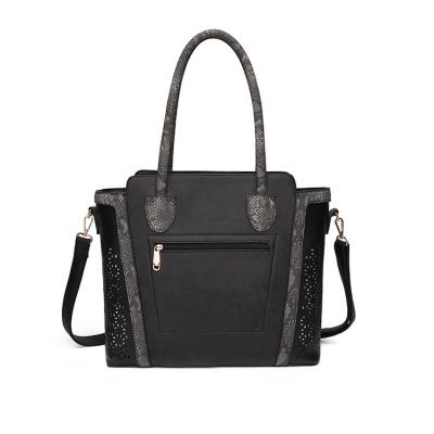 China Luxury Cool Pattern Outdoor Dog Handbag Pet PU Leather Carrier for sale