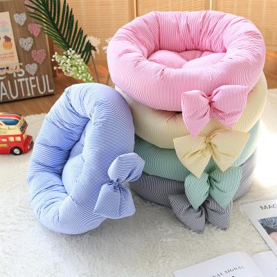 China Cute Bows Stripes Dog Beds Cotton Flocked Round Pet Cushion for sale