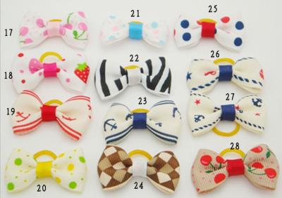 China Design Cute Dog Bows Bands Beauty Pet Hair Bowties Clips for sale