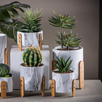China Round Pot Planters Succulents Planters Clay Flower Pots Mini Planter Pots Cement Flowerpots for sale